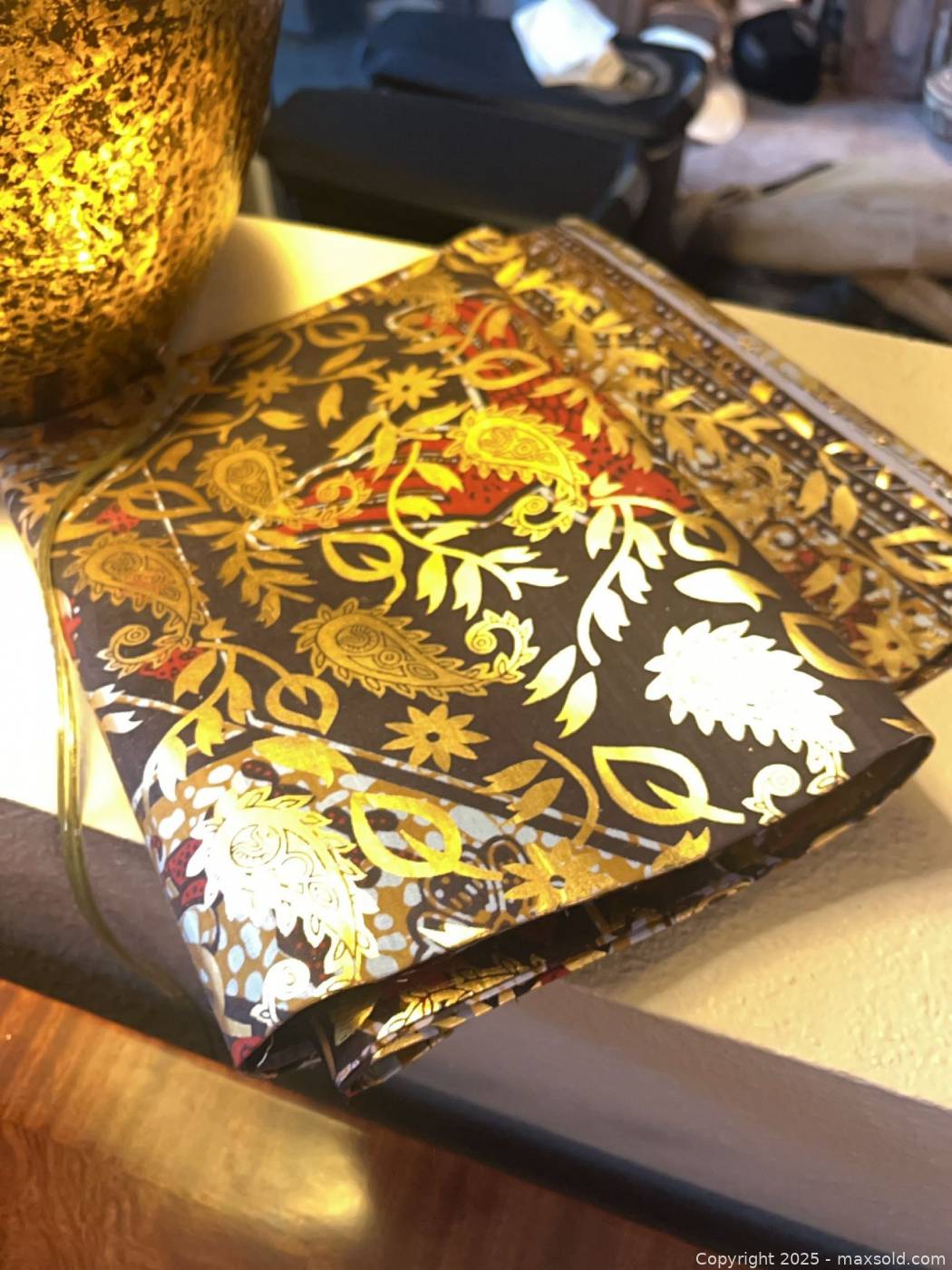 Ethan Allen gold-tone table lamp and gold/black table runner | Maxsold