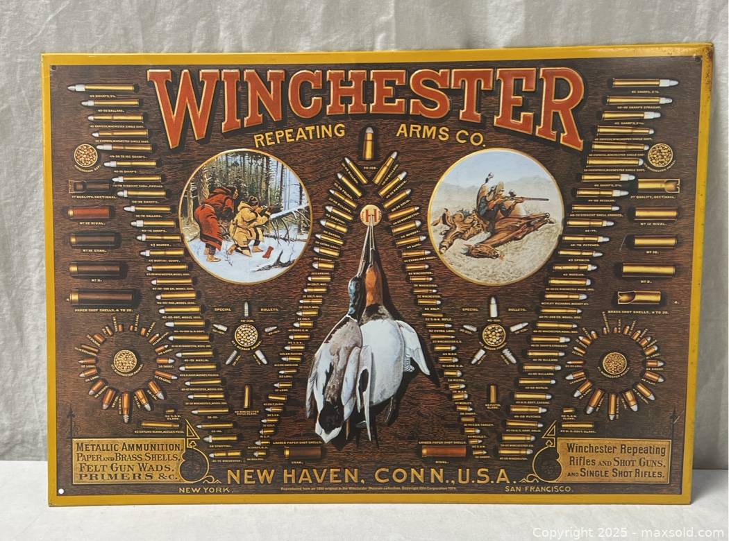 Embossed Winchester Repeating Arms metal sign | Maxsold
