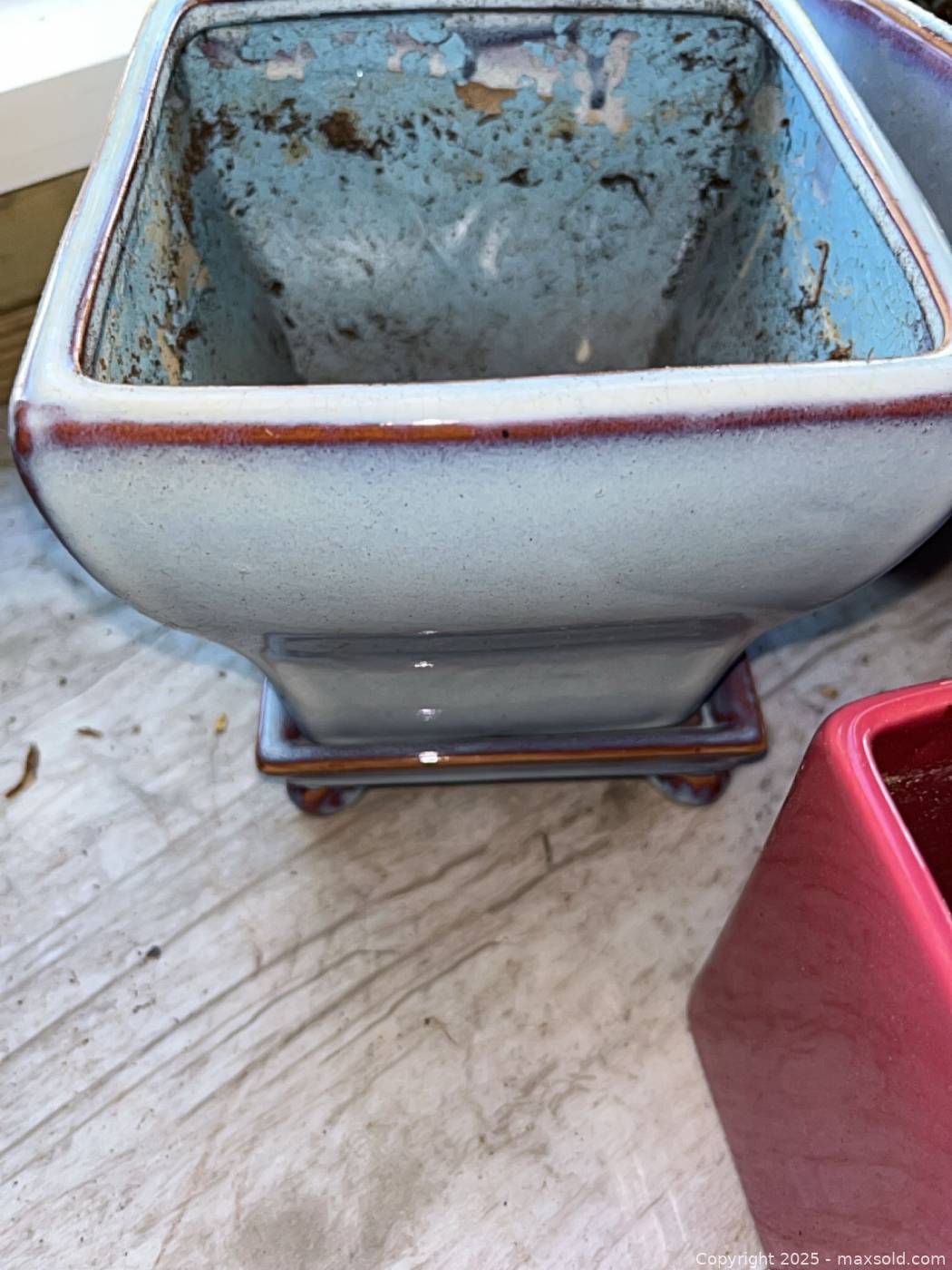 10 assorted medium planters with watering can | Maxsold