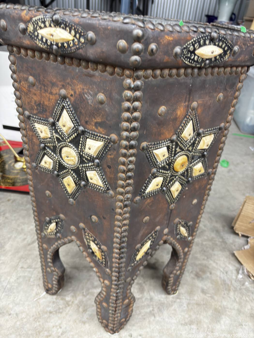 Moroccan-style studded leather side table | Maxsold