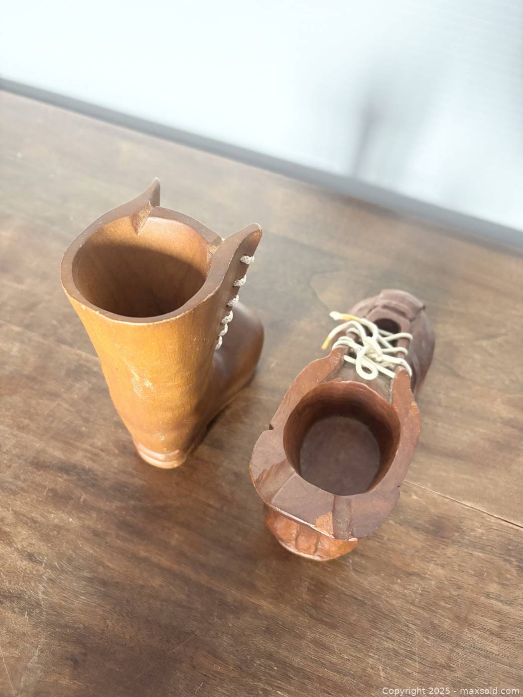 Wooden carved boot and shoe decor | Maxsold