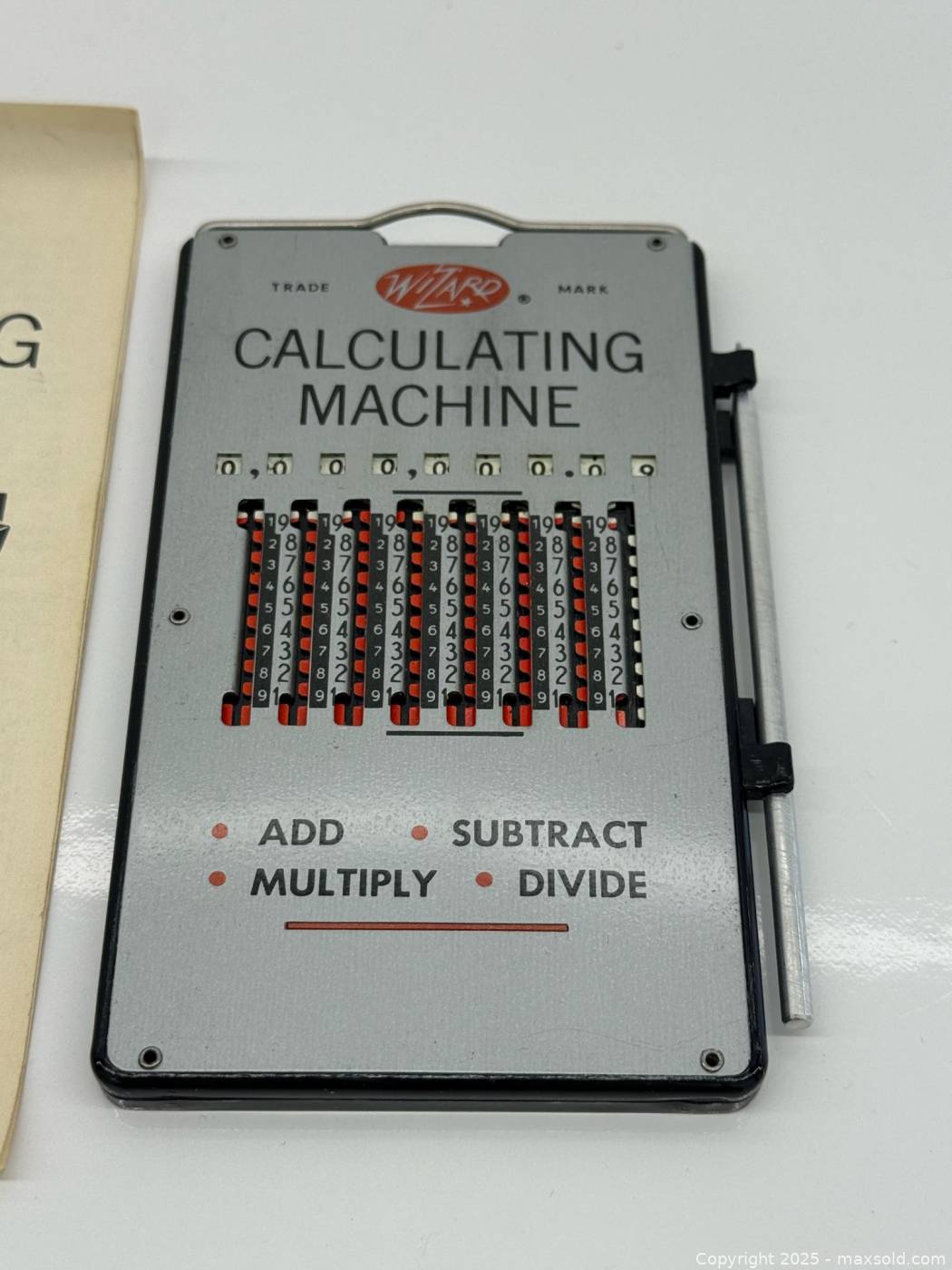 Wizard mechanical calculating machine with manual | Maxsold