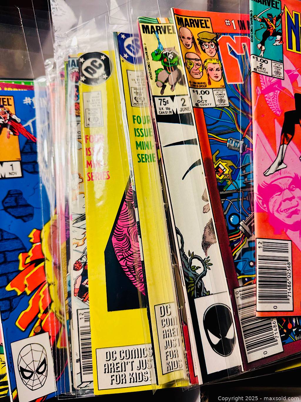 Long box with 200+ Marvel & DC comics | Maxsold