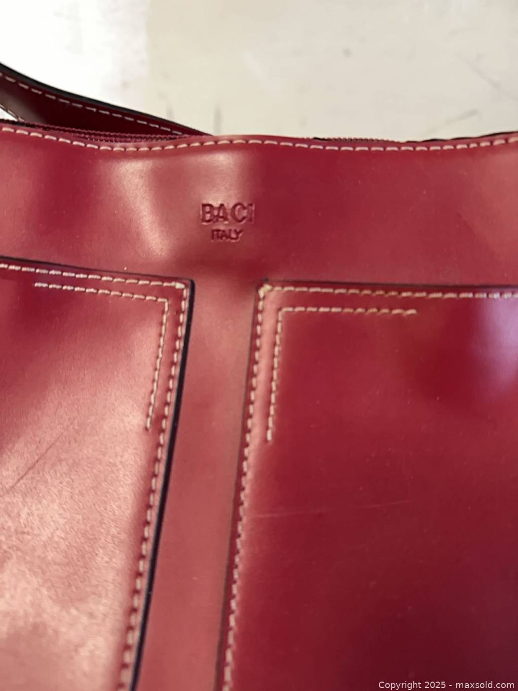 Red leather Baci purse | Maxsold