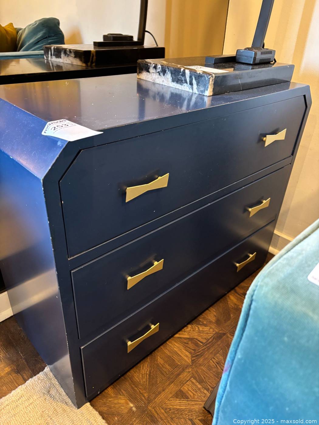 Royal blue three-drawer dresser chest with gold handles | Maxsold