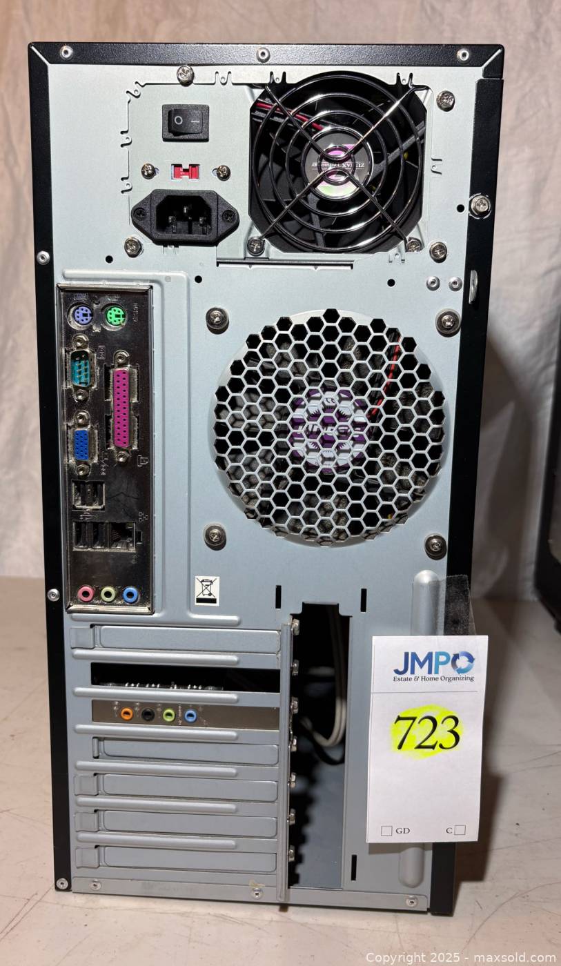 Three desktop computer towers | Maxsold