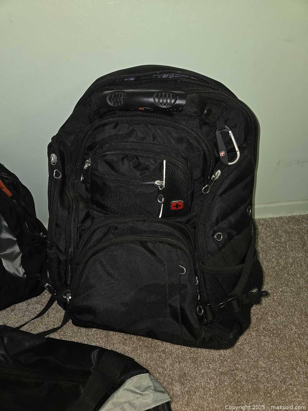 SwissGear backpack, second backpack, Roots duffel | Maxsold