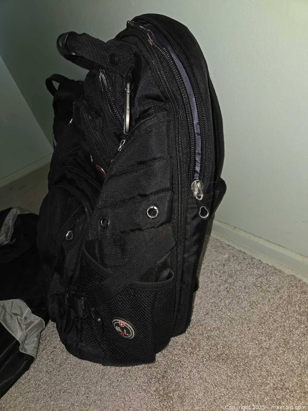 SwissGear backpack, second backpack, Roots duffel | Maxsold