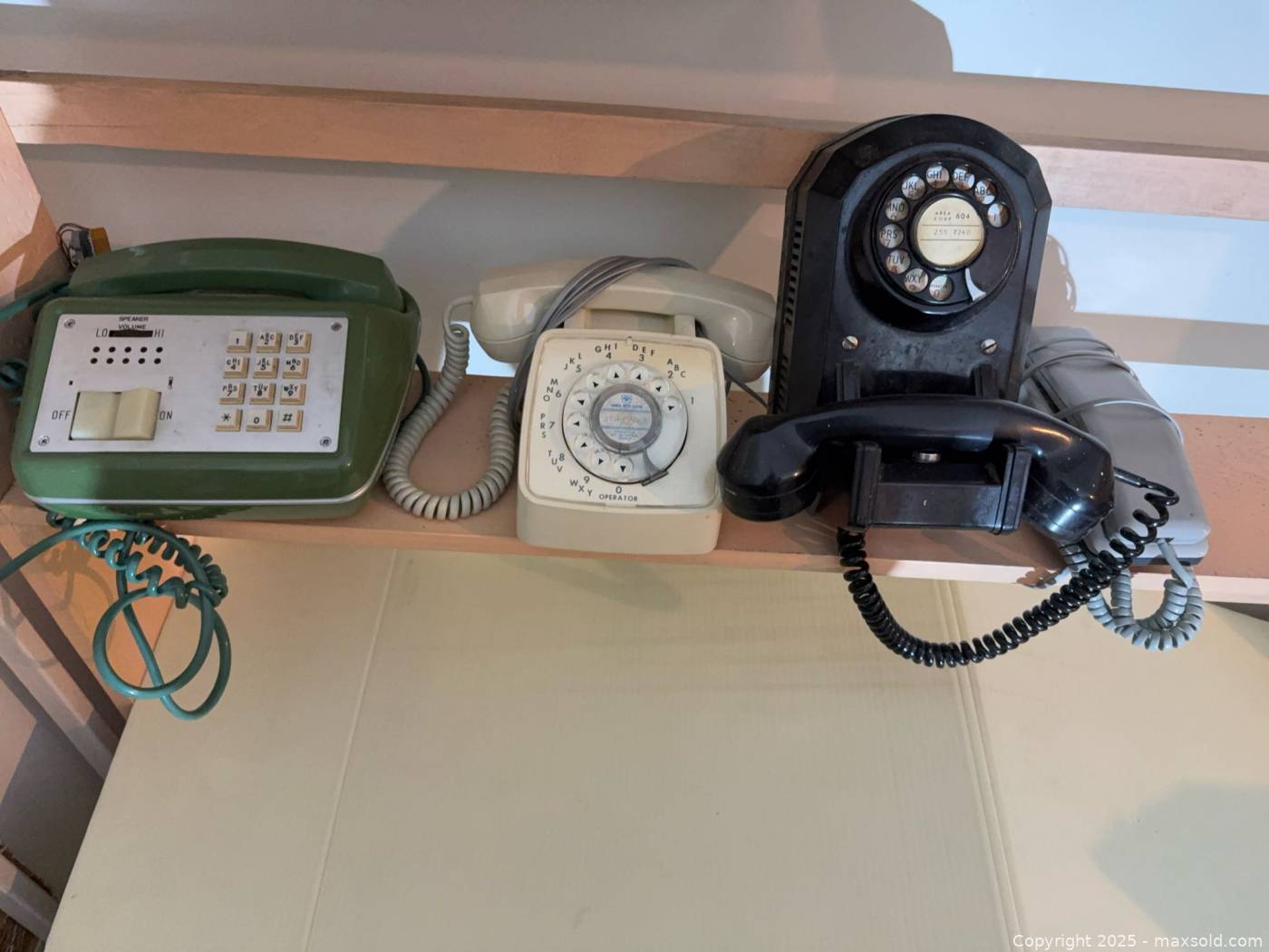 Three vintage rotary and push-button phones | Maxsold