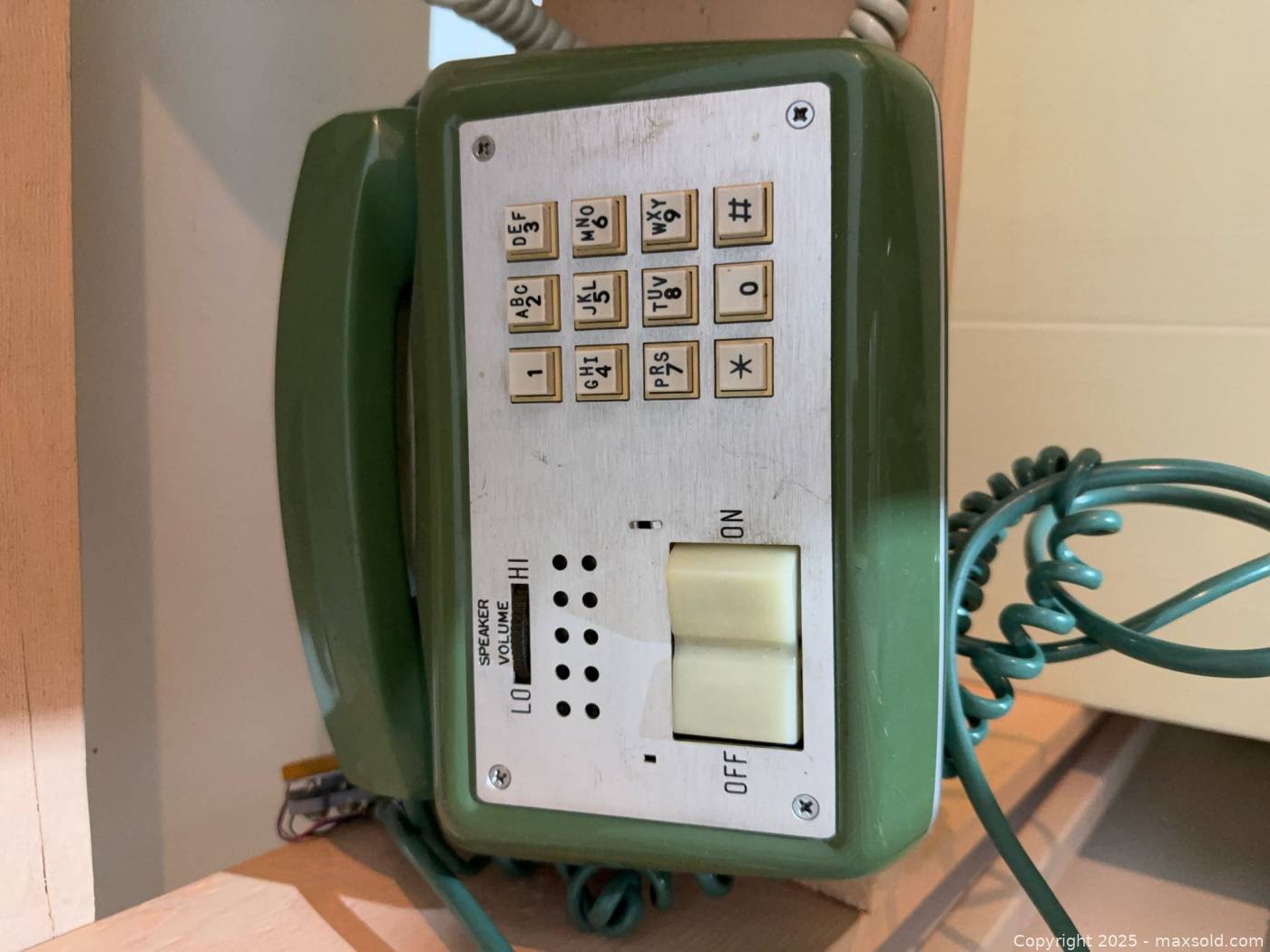 Three vintage rotary and push-button phones | Maxsold