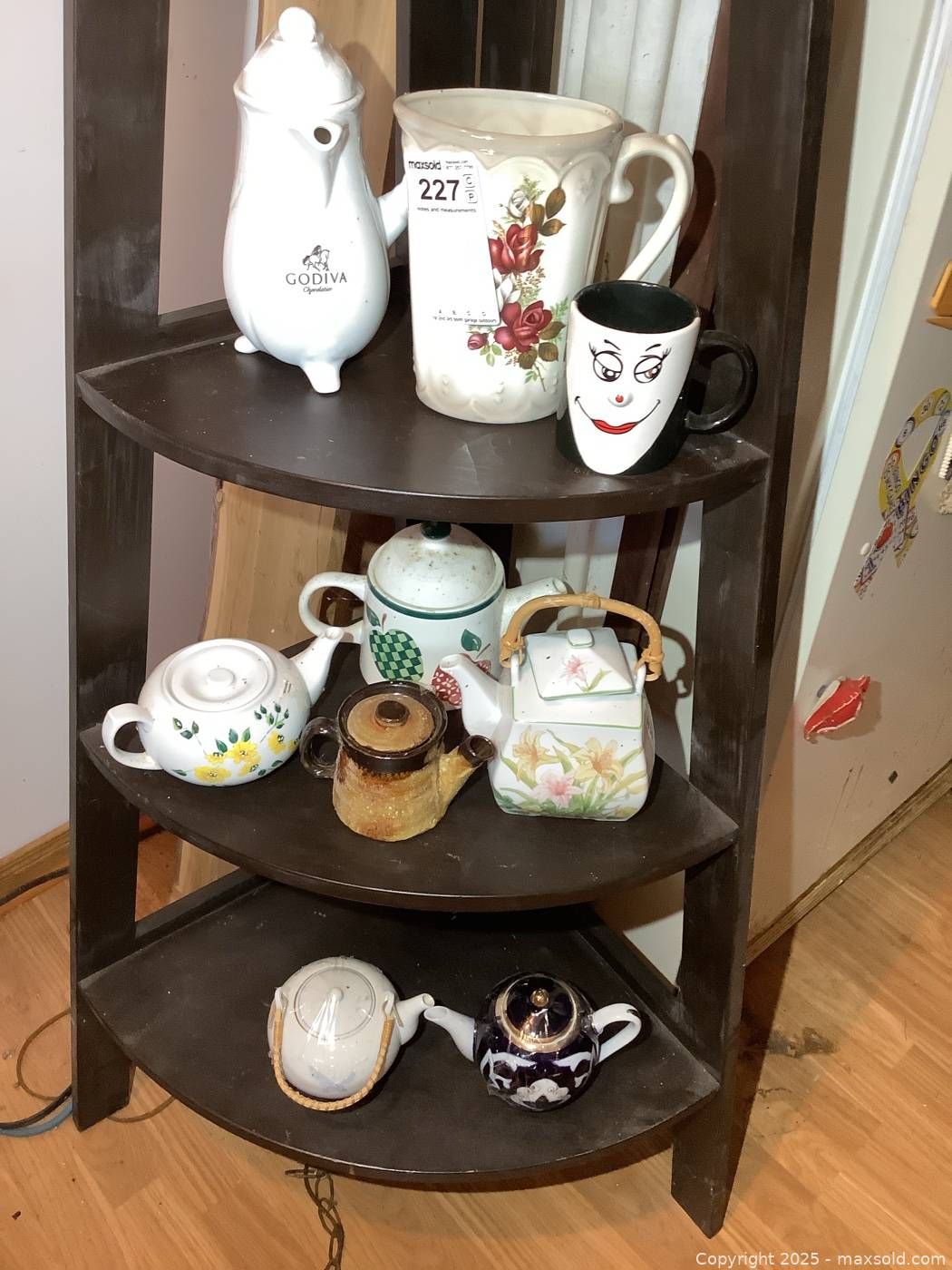 Assorted ceramic teapots, floral pitcher, face mug | Maxsold