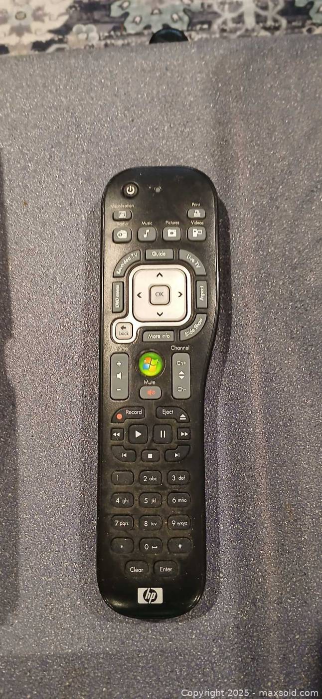 Logitech Harmony 300i remote, Microsoft Media Center keyboard, HP Media ...