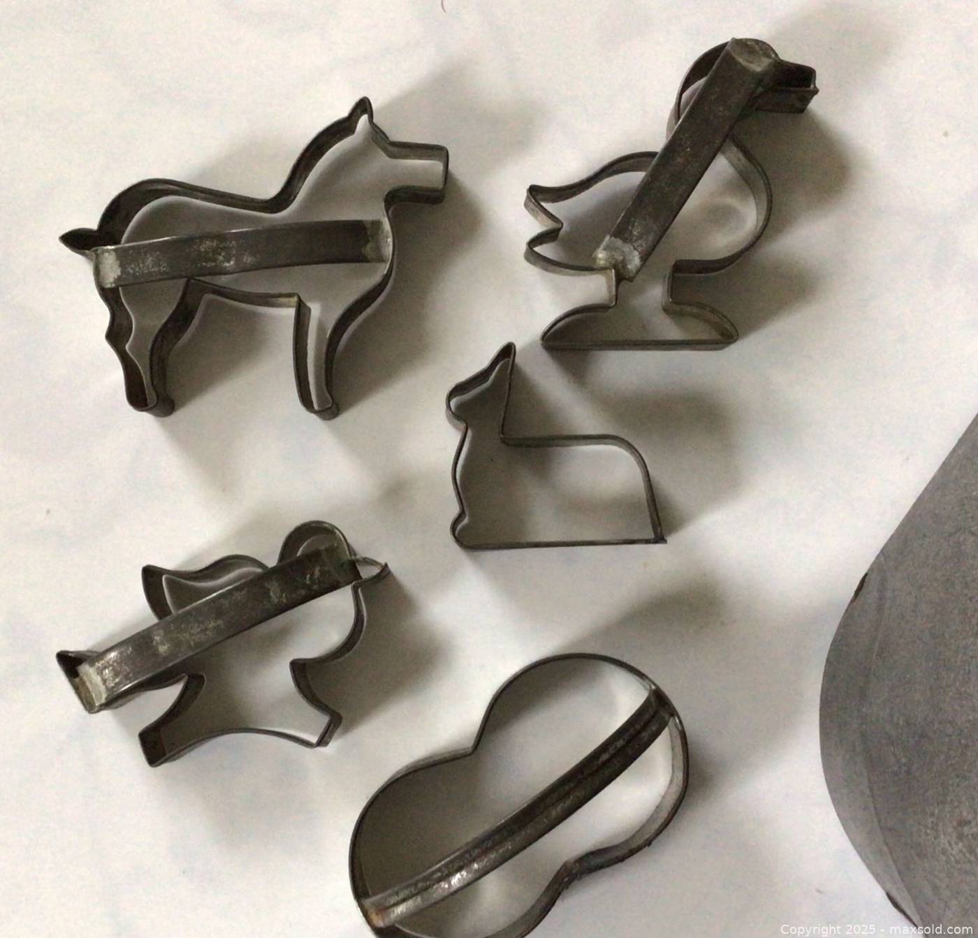 Antique Tin Cookie Cutters And Aluminum Grain Scoop | Maxsold