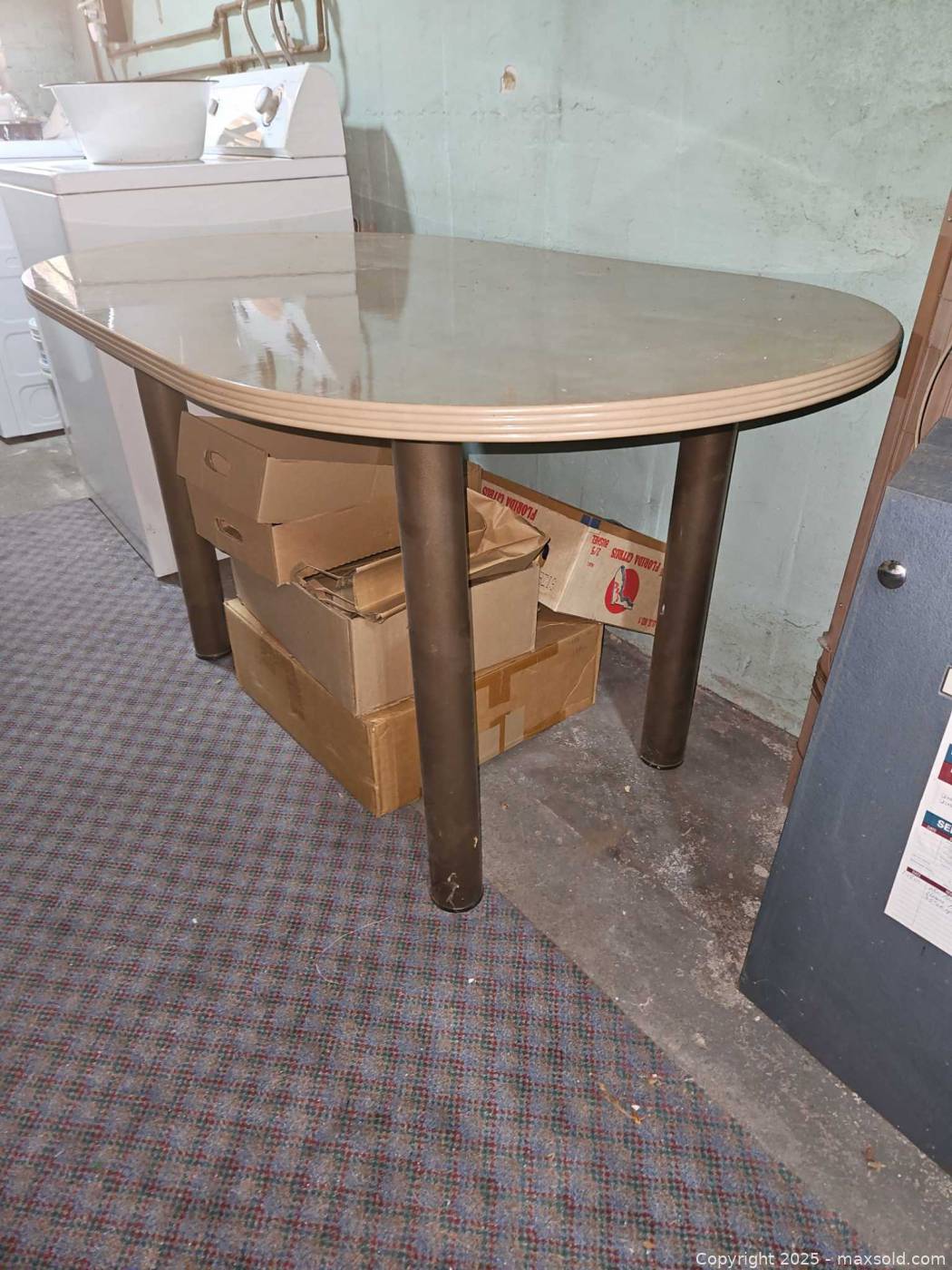 Vintage oval Formica dining table | Maxsold