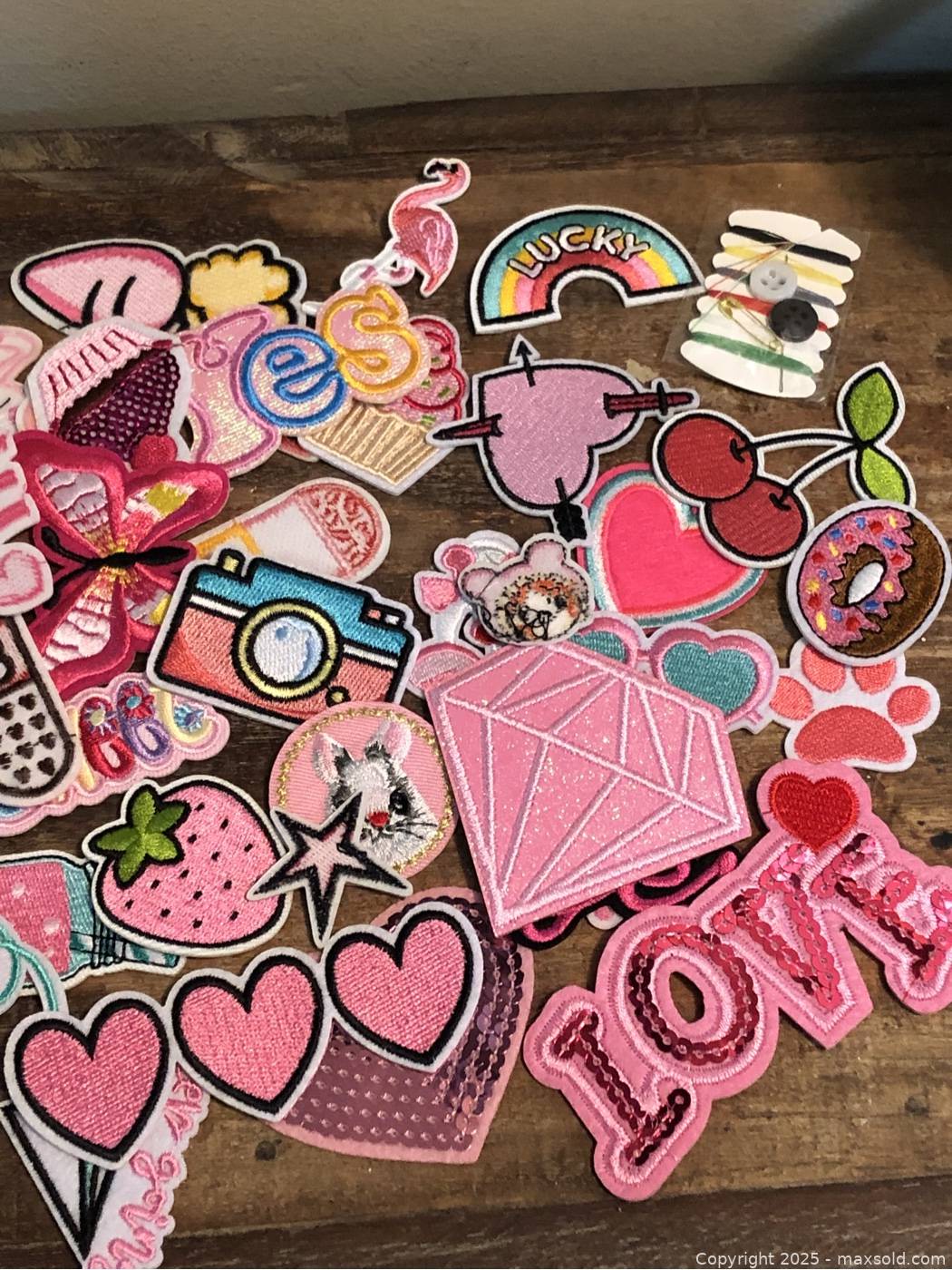 60 New Sew-On Embroidered Patches | Maxsold