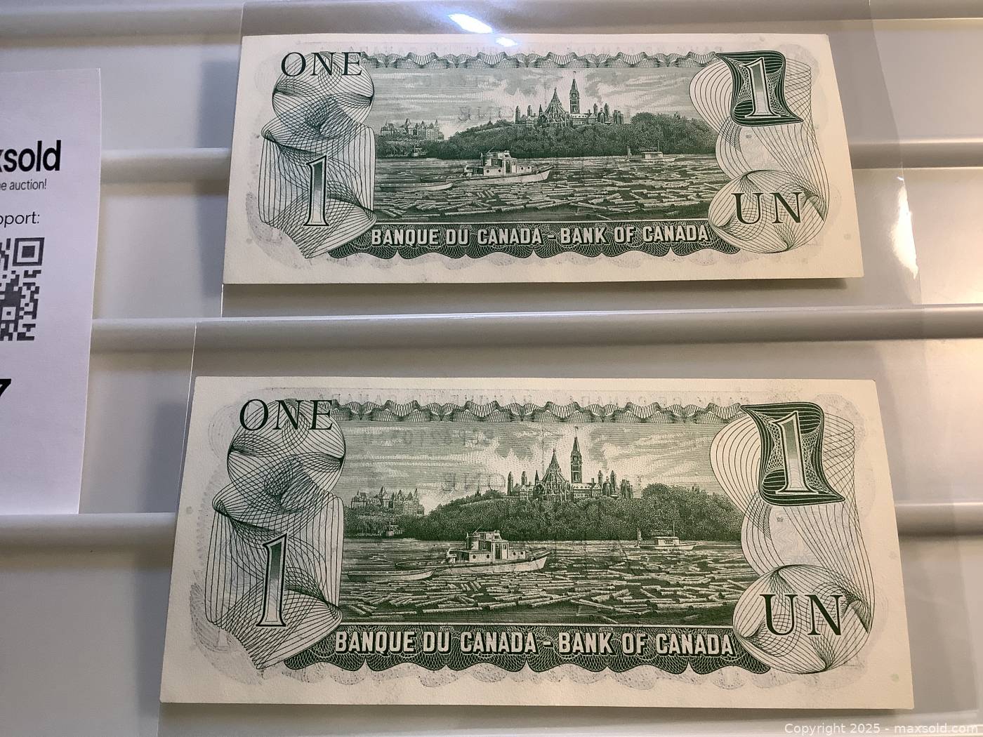 Two Canadian 1973 one-dollar banknotes | Maxsold