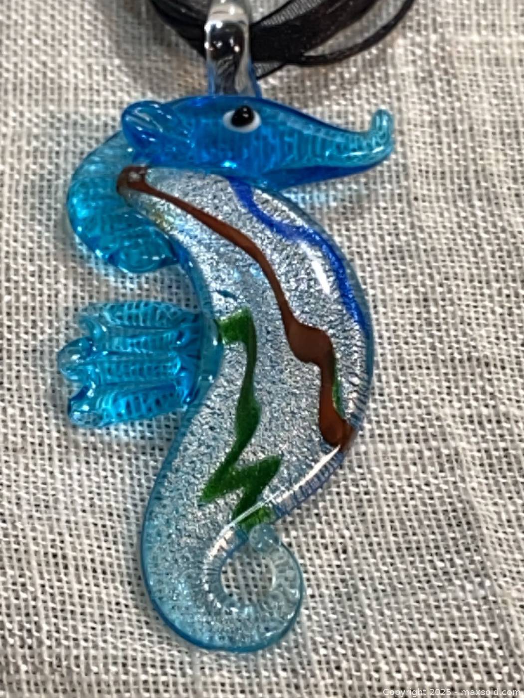 7 glass pendant necklaces on 18" cords | Maxsold