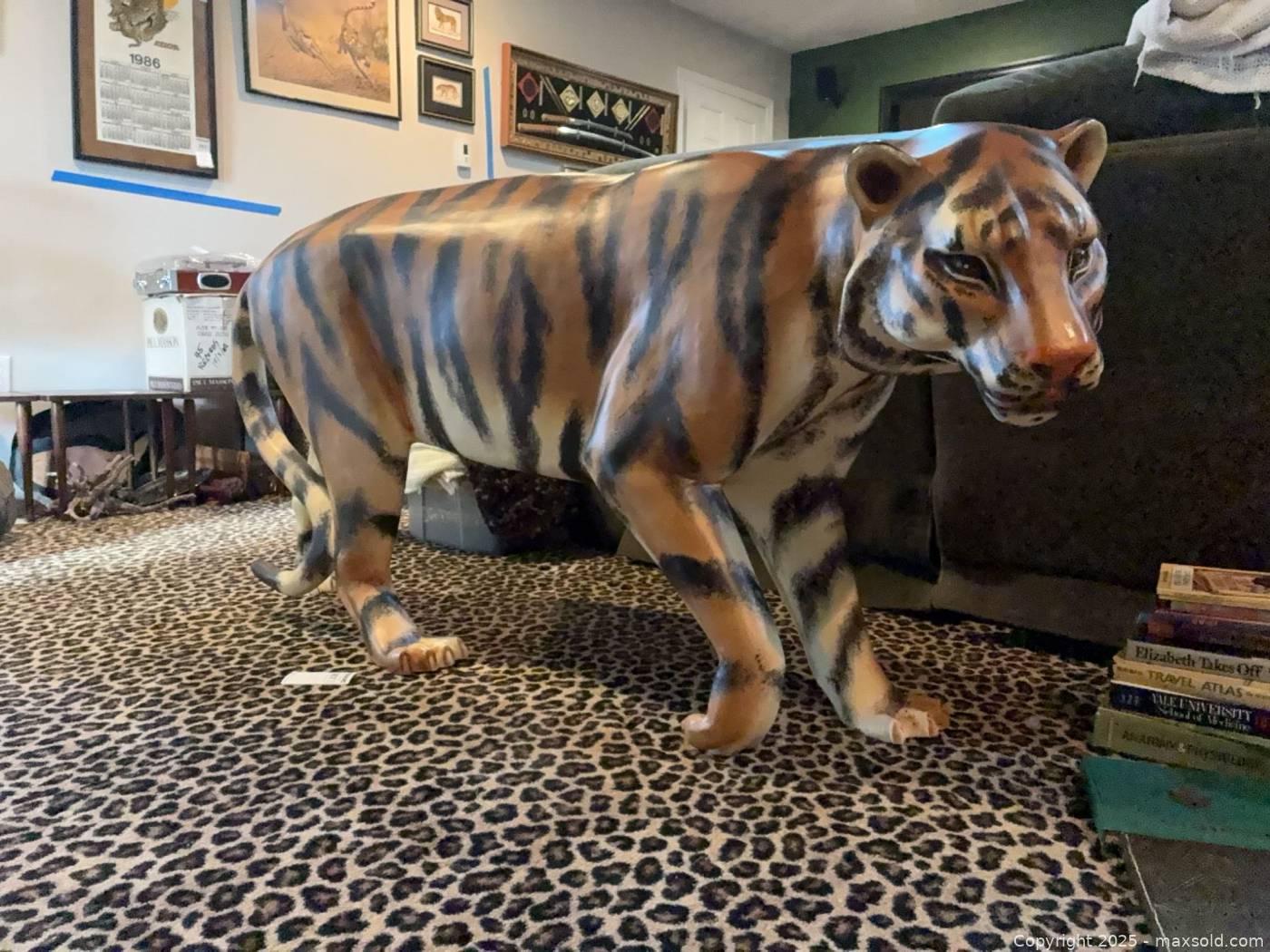 Life-size plastic tiger statue, 68" long | Maxsold
