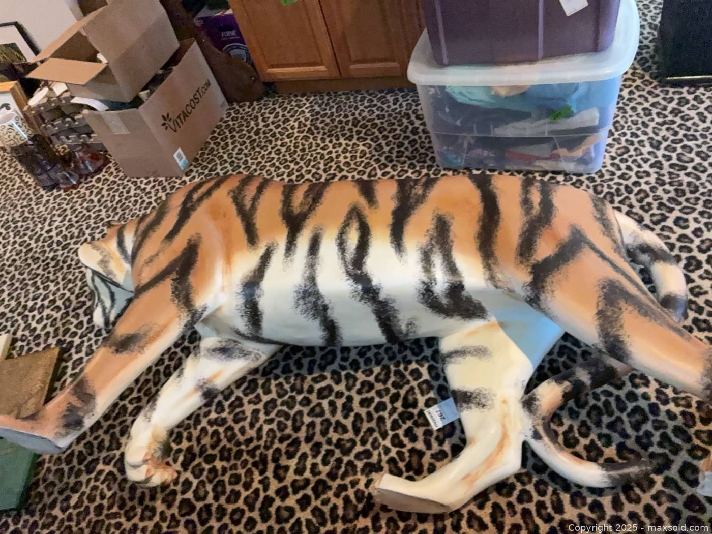 Life-size plastic tiger statue, 68" long | Maxsold