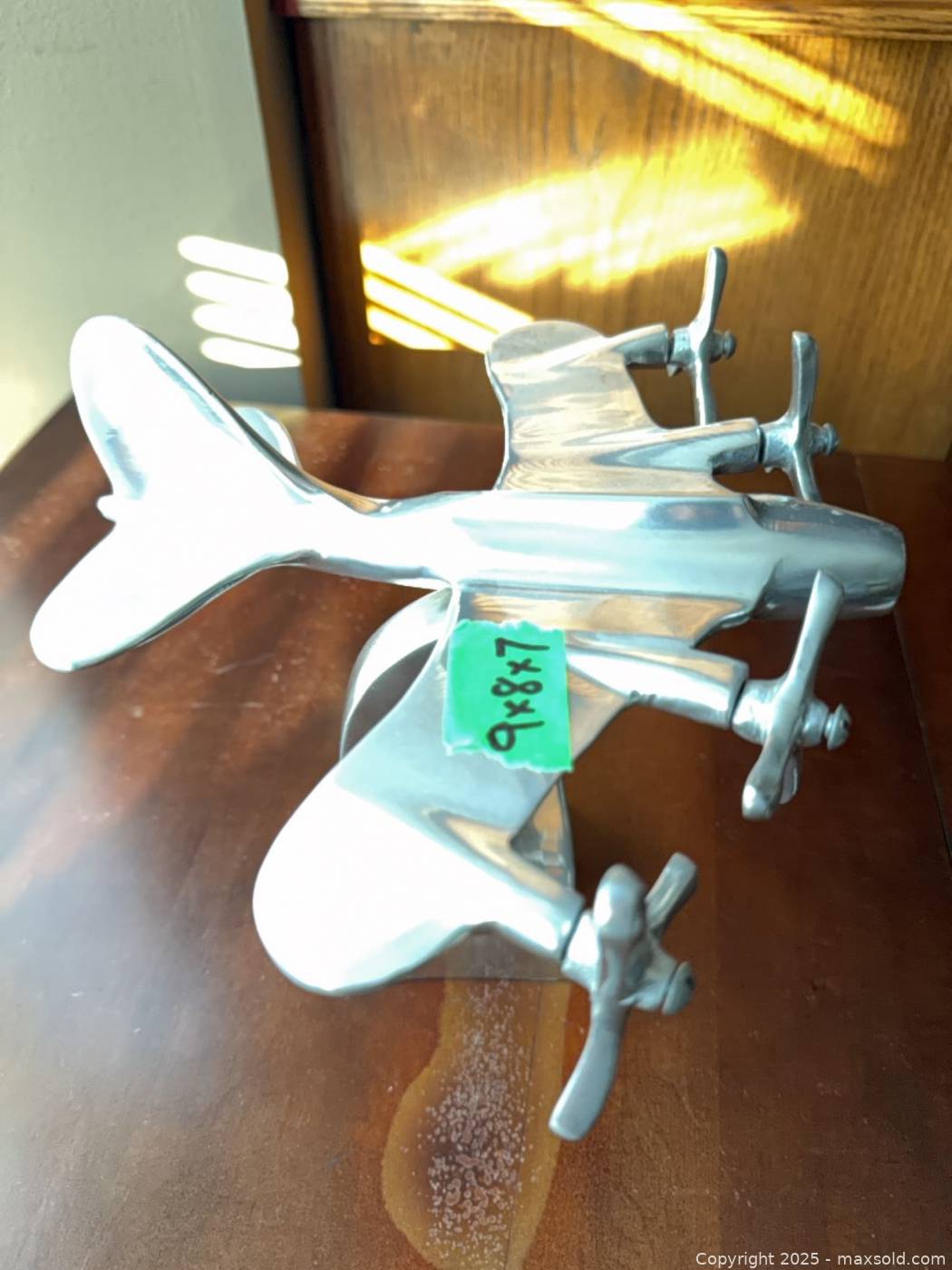 Polished Metal Airplane Sculptures, Pair | Maxsold