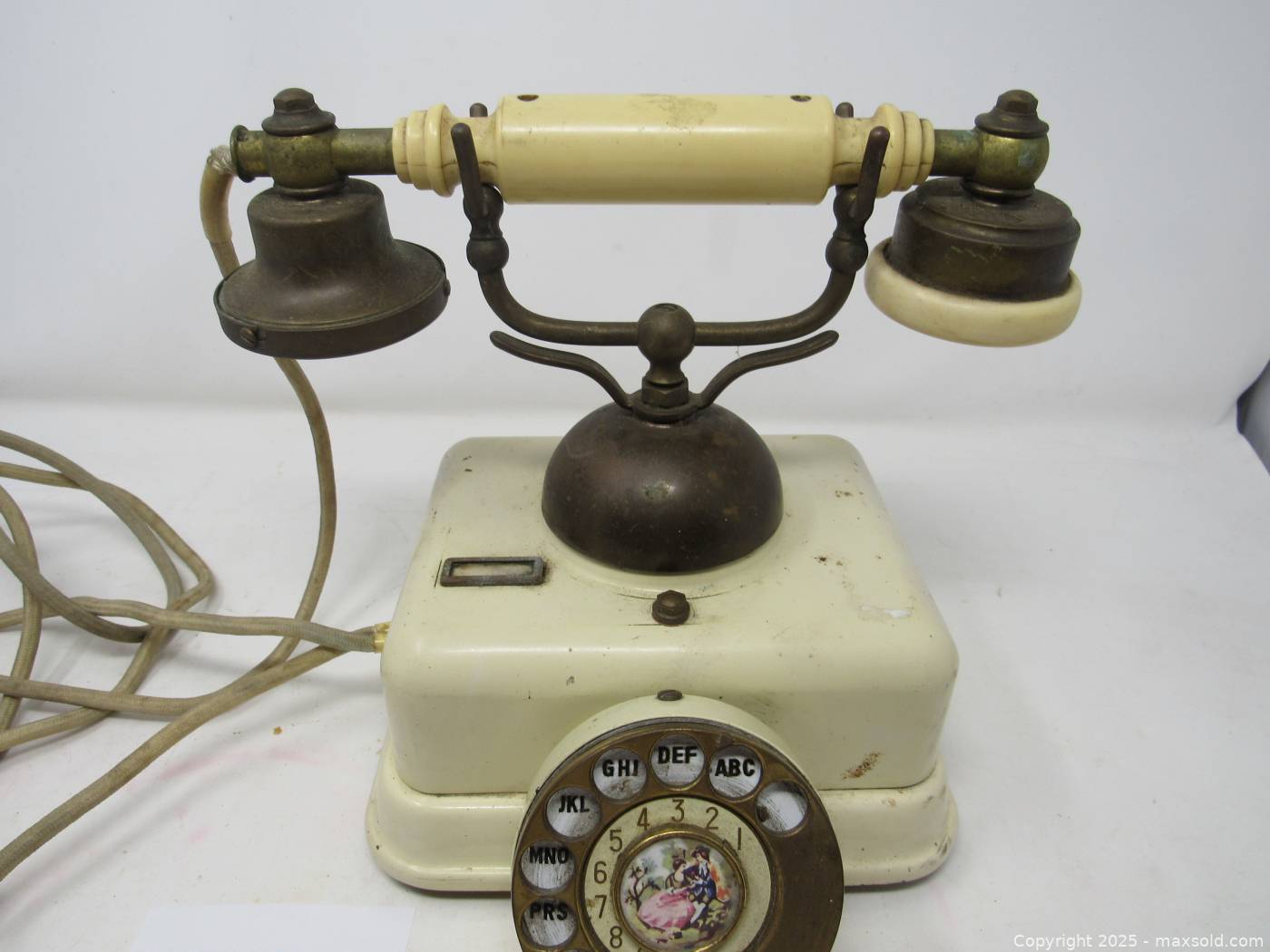 Antique cream rotary dial telephone | Maxsold