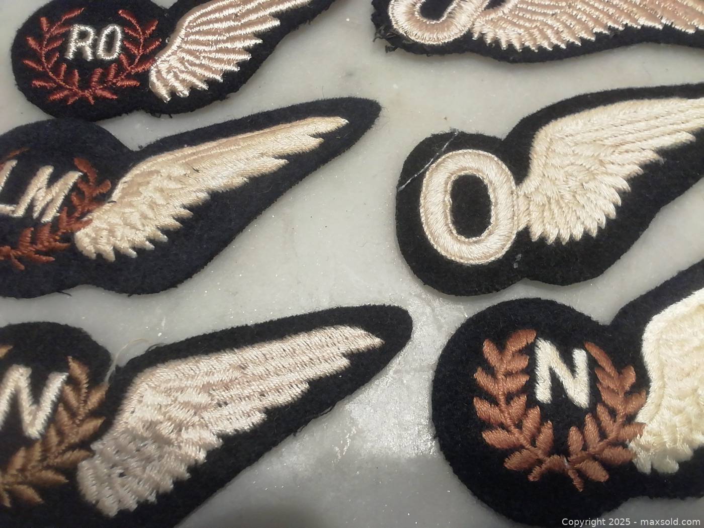 Nine RCAF half-wing trade badges | Maxsold