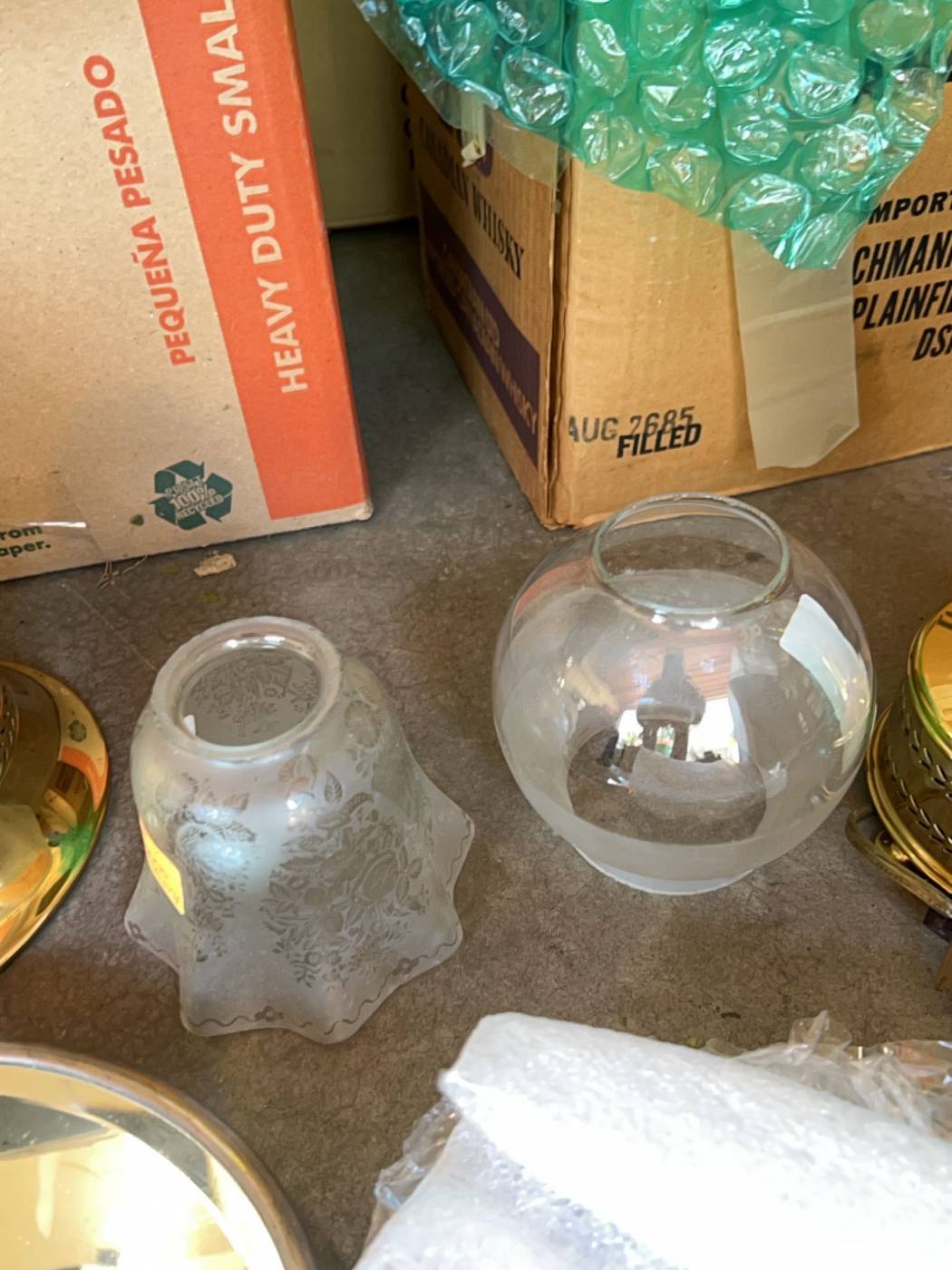 Brass lamp bases, glass globes, oval mirror | Maxsold