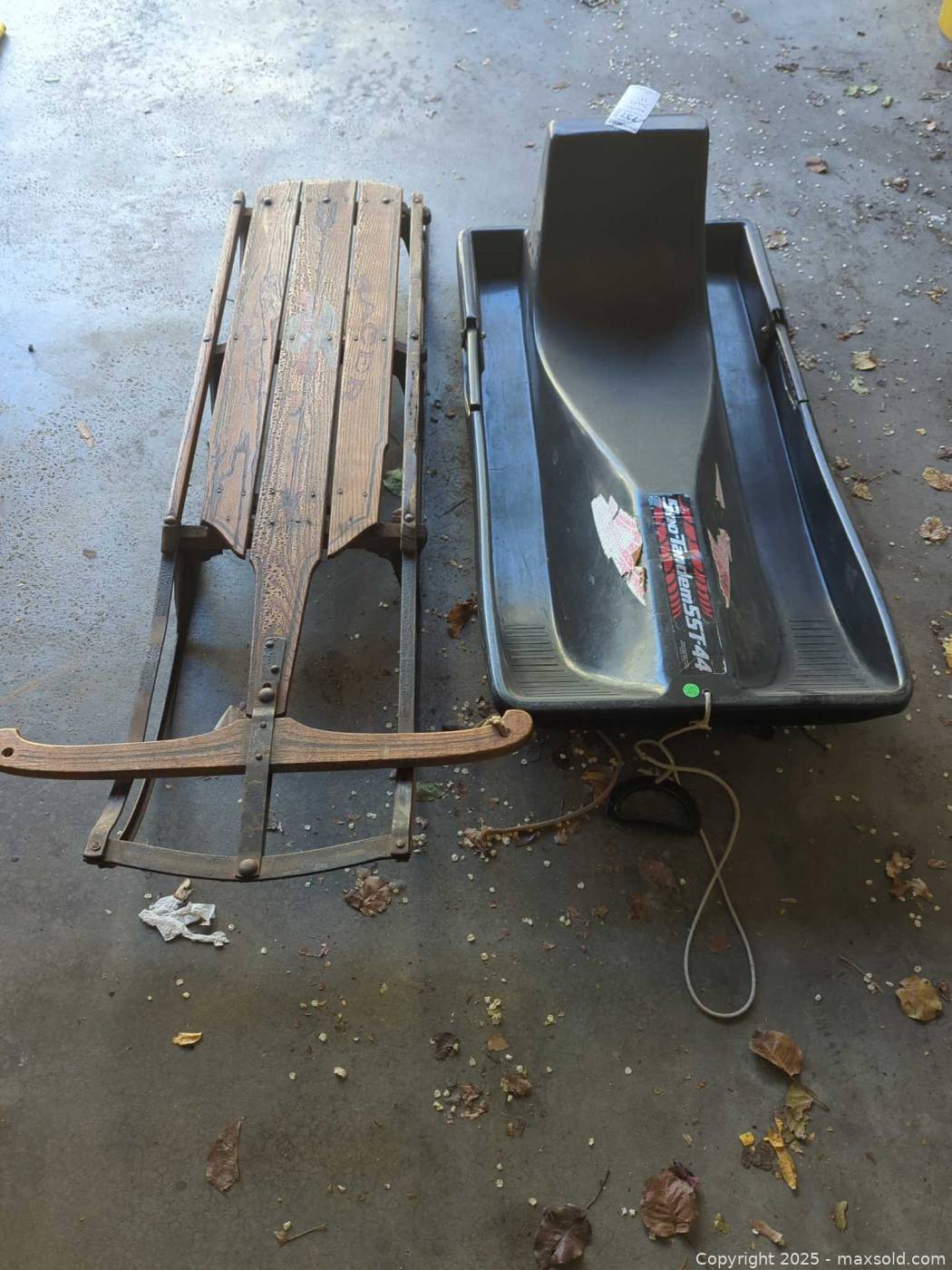 Flexible Flyer wood sled and Sno-Tandem SST-44 plastic sled | Maxsold