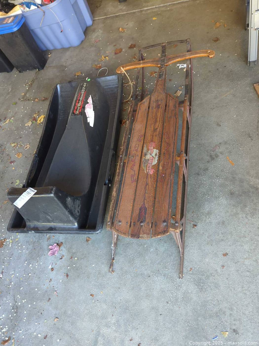 Flexible Flyer wood sled and Sno-Tandem SST-44 plastic sled | Maxsold