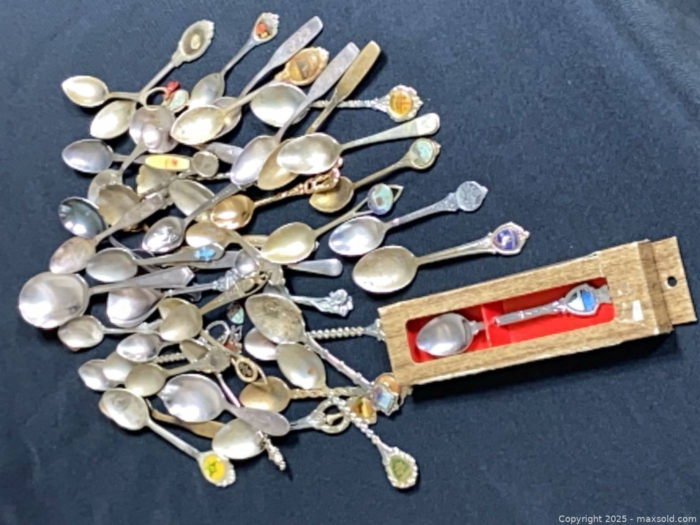 Approx. 45 souvenir collector spoons, mostly Canadian, mixed silver ...