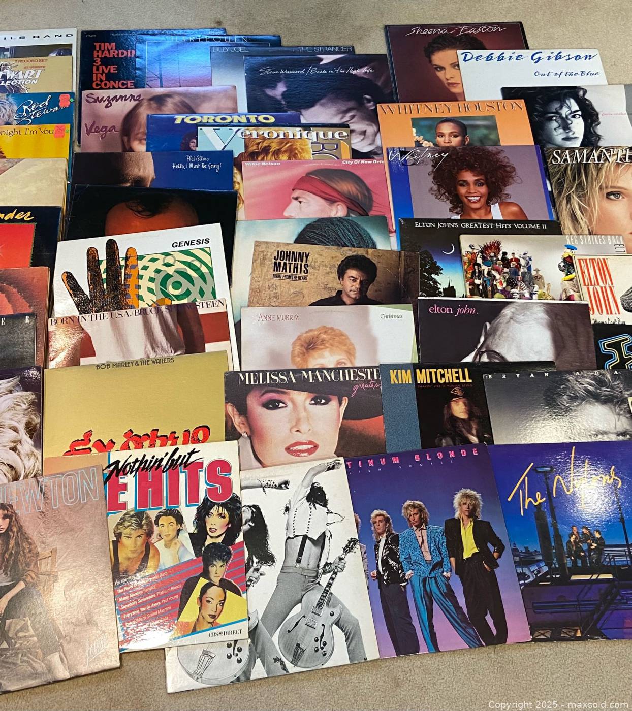 50+ pop and rock vinyl LP records | Maxsold