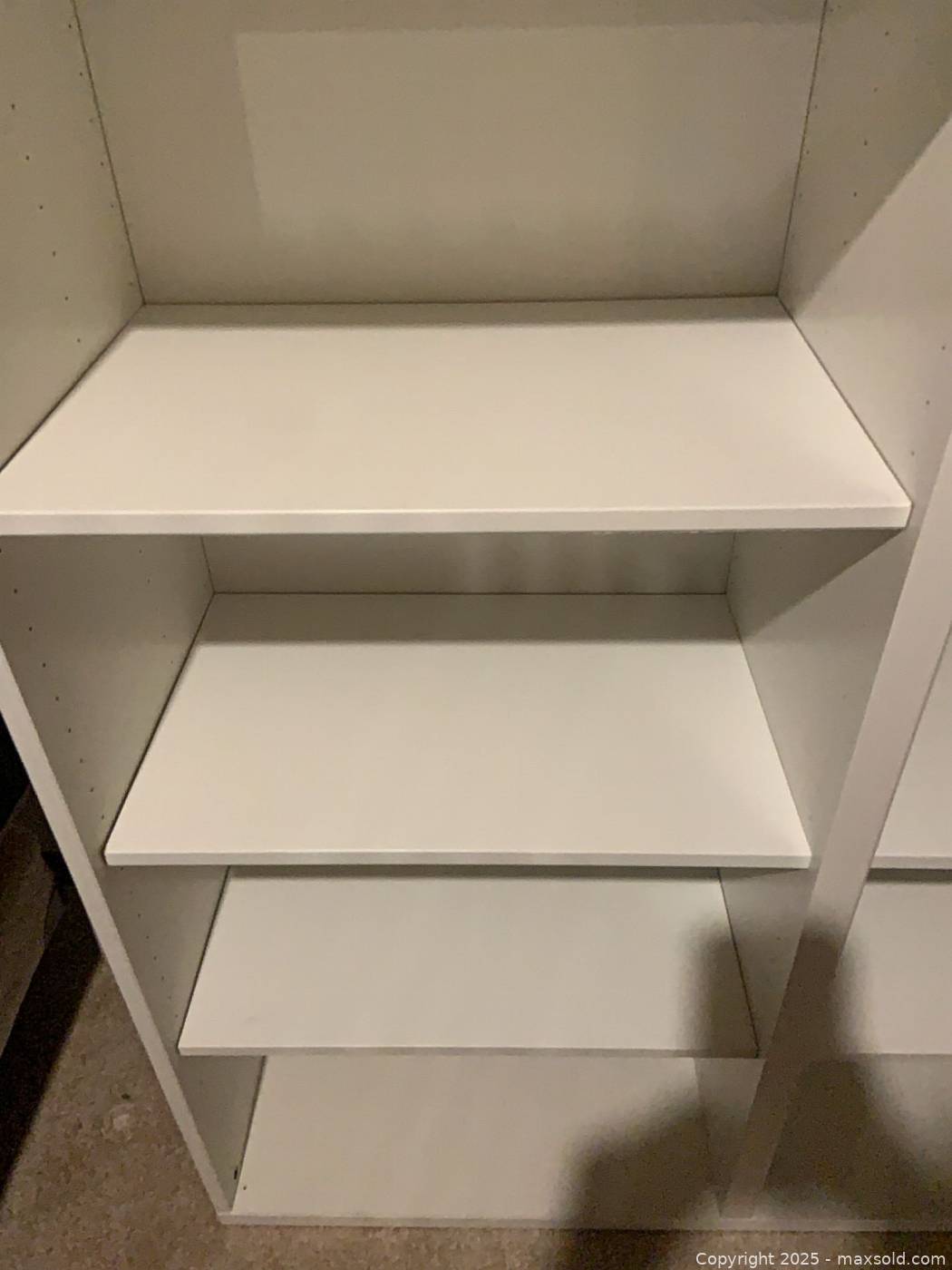 White IKEA adjustable 6-shelf storage unit | Maxsold