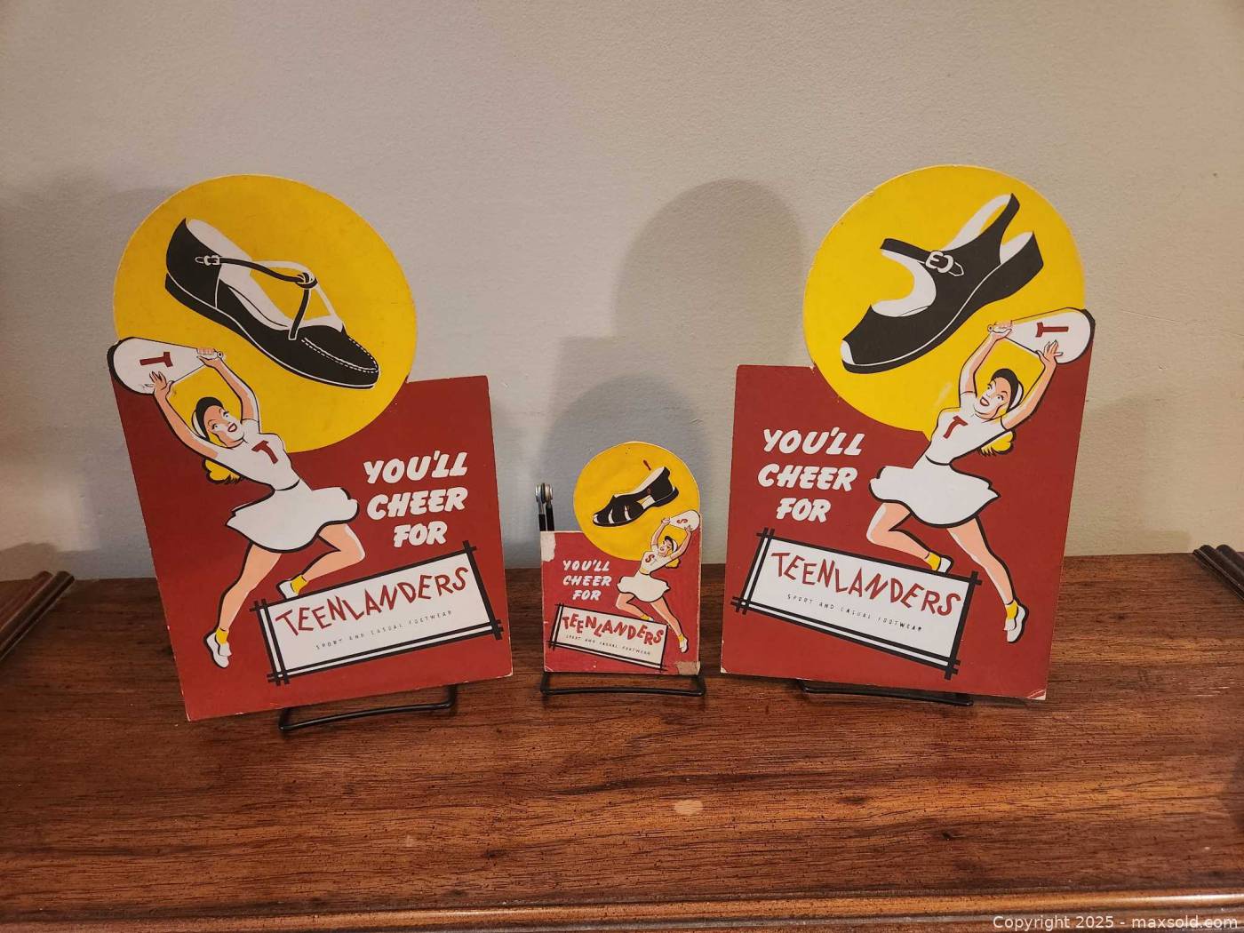 Teenlanders cardboard shoe advertising signs | Maxsold
