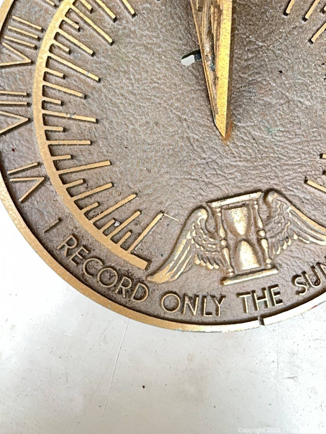 Brass round sundial with inscription | Maxsold