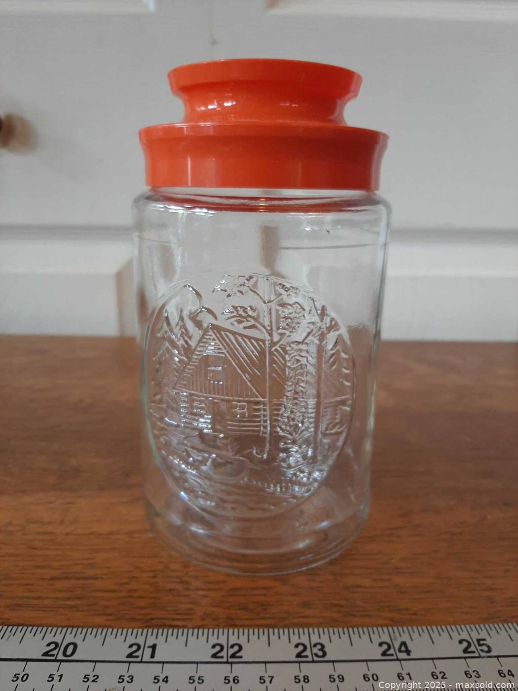 Anchor Hocking "Cabin" Tang glass jar with orange lid | Maxsold