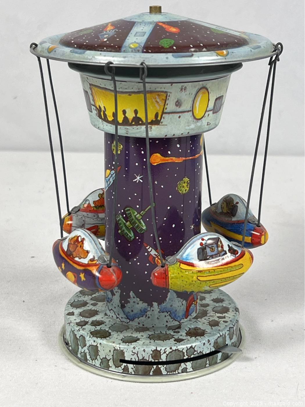 Tin Toy Rocket Ship Ride wind-up tin litho | Maxsold