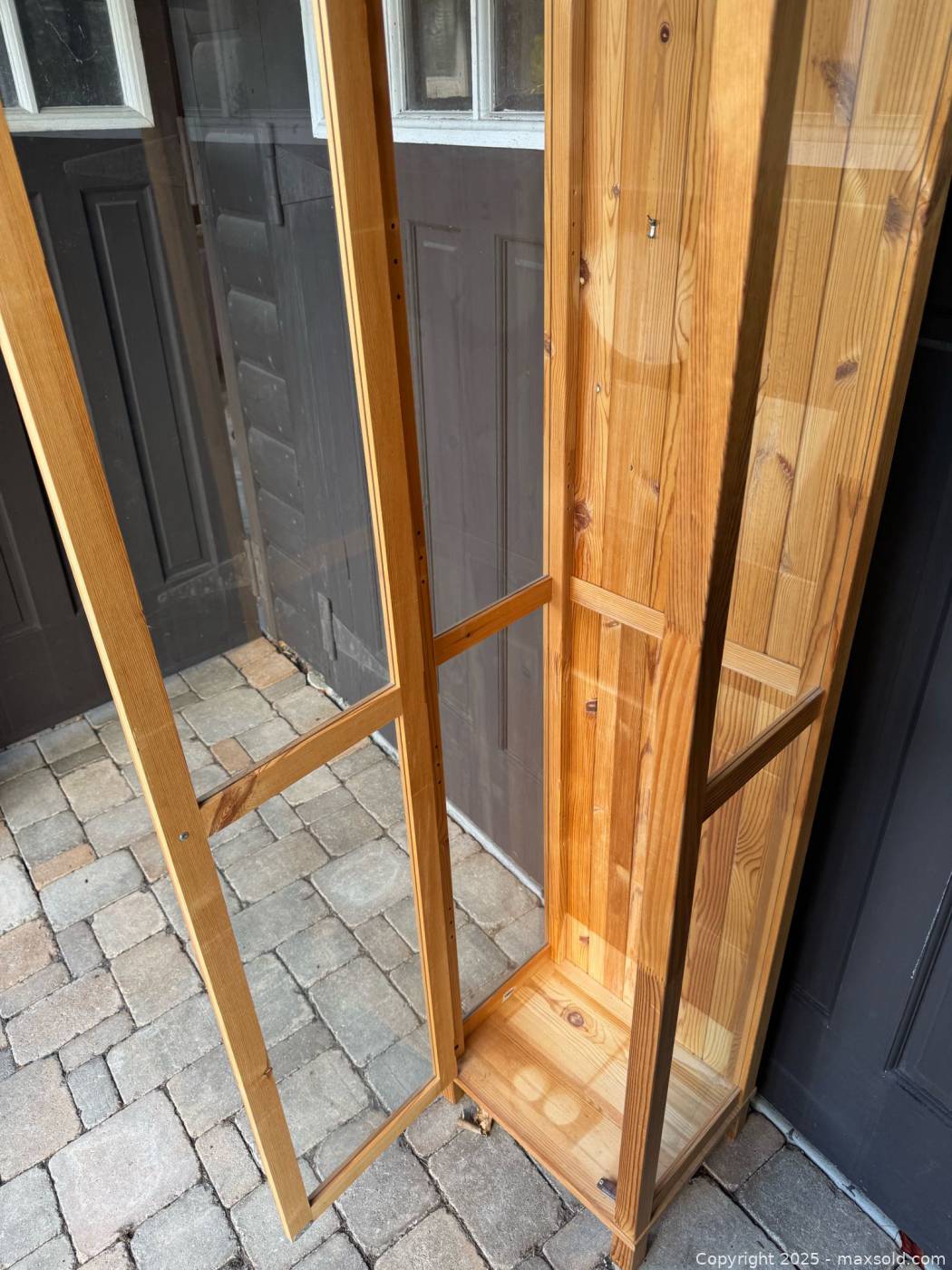 Tall pine display cabinet | Maxsold