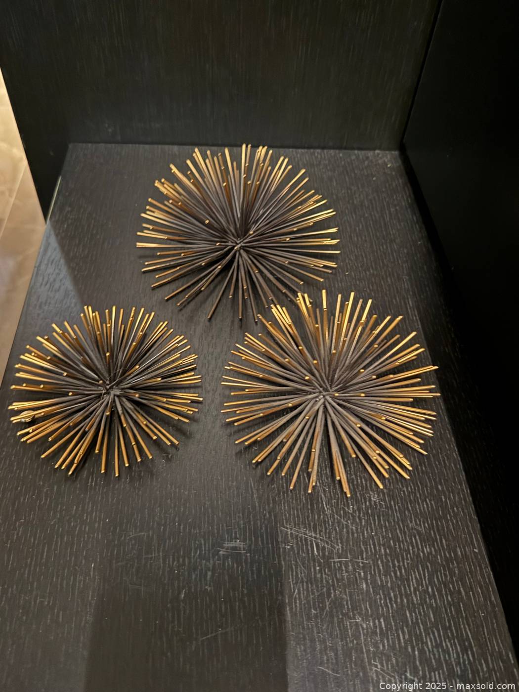 Set of three metal spike sculptures | Maxsold