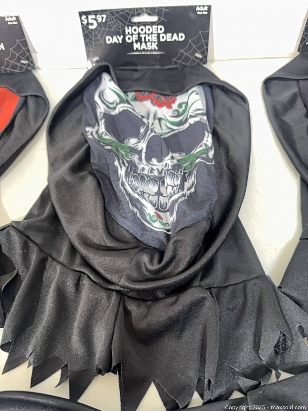 Four hooded Halloween masks | Maxsold