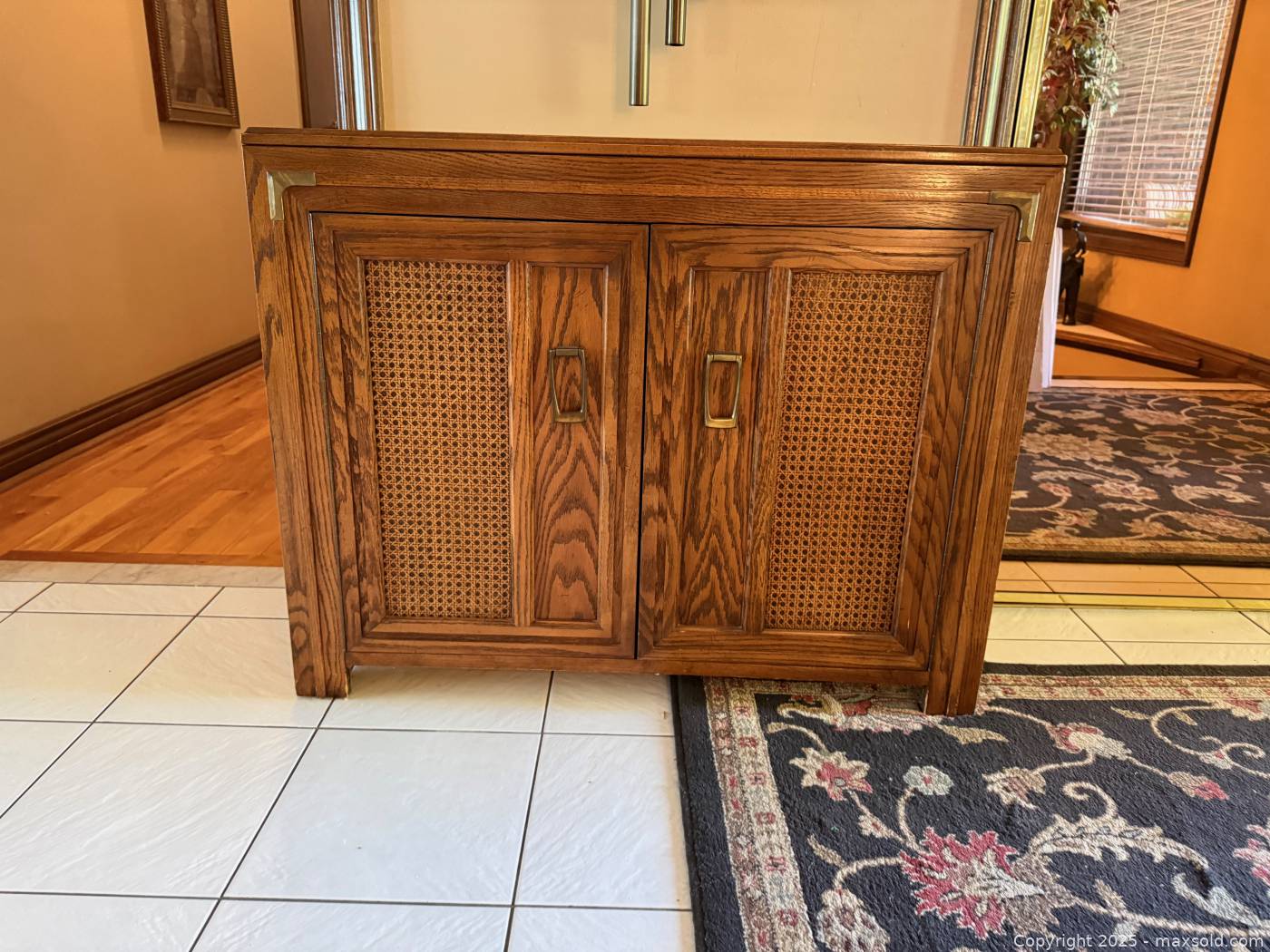 Vintage wooden 2-door cane front cabinet | Maxsold