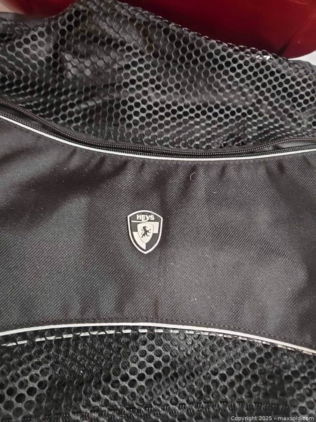 Heys metallic red hardside carry-on suitcase | Maxsold