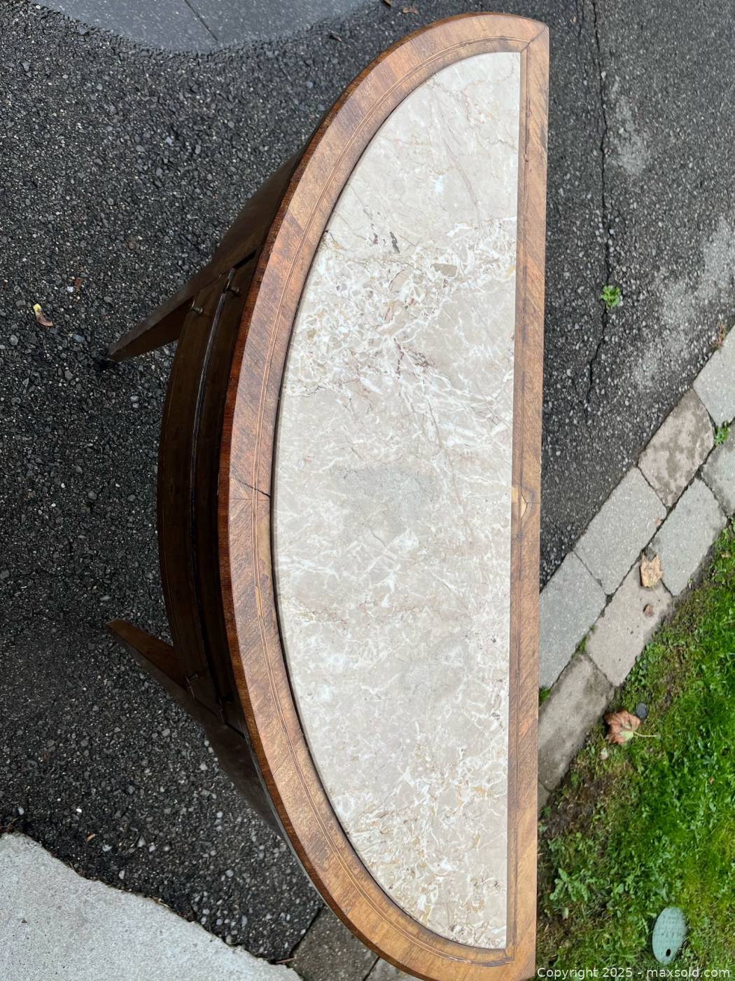 Half-moon wood console table with stone top | Maxsold