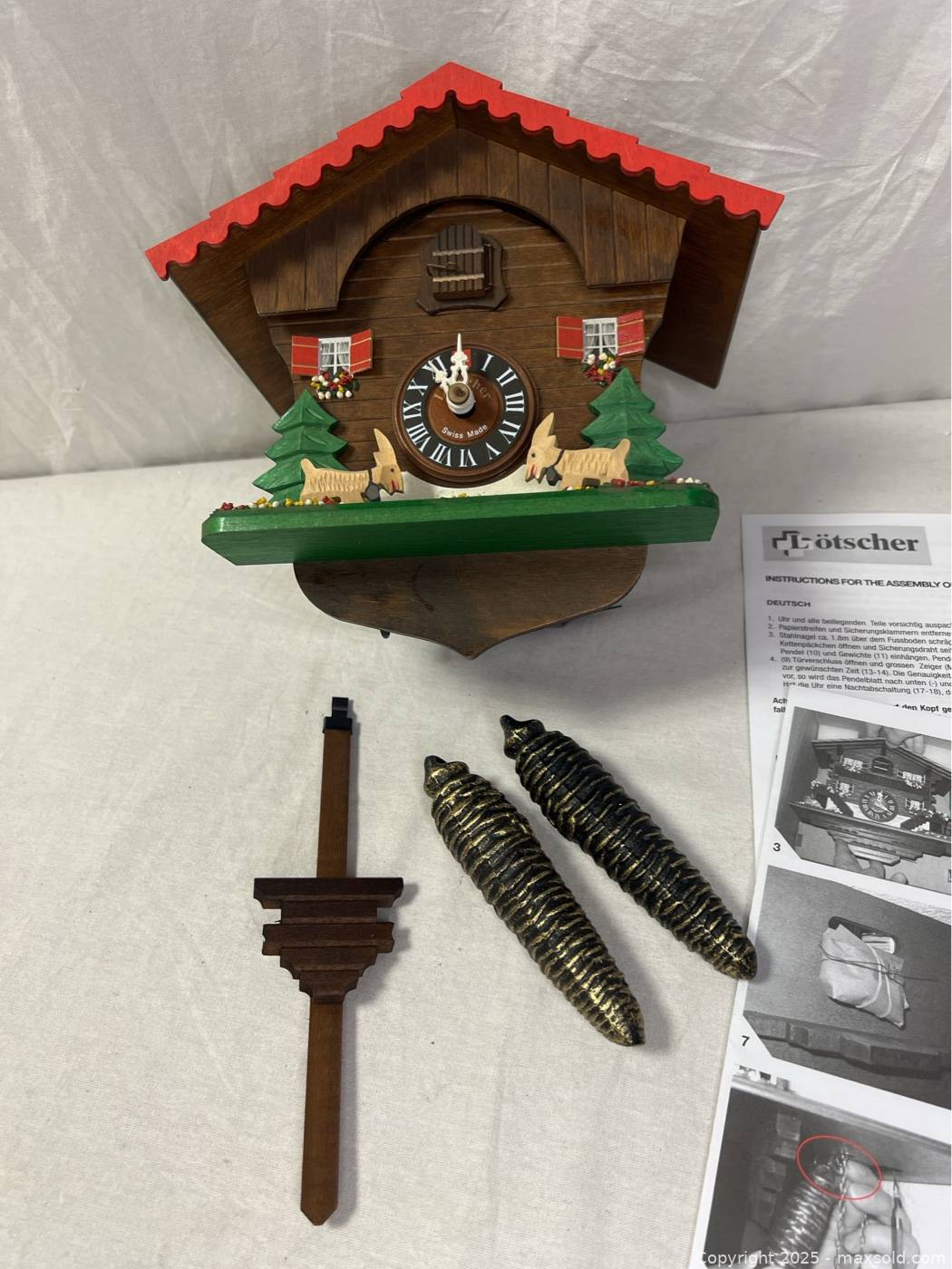 Lötscher Swiss chalet cuckoo clock with manual | Maxsold