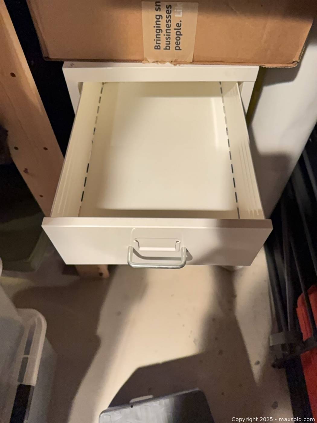 White metal 5-drawer storage unit | Maxsold