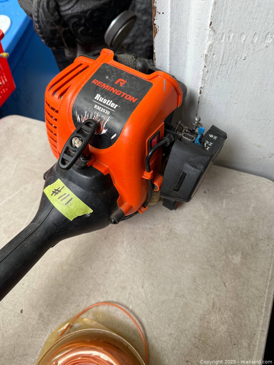 Remington Rustler RM2530 gas string trimmer and trimmer line | Maxsold