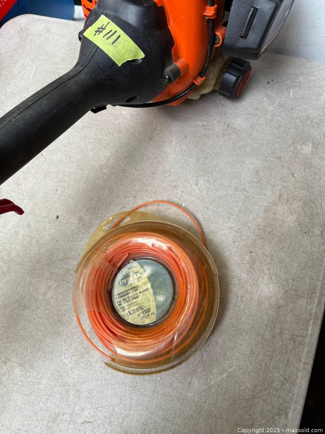 Remington Rustler RM2530 gas string trimmer and trimmer line | Maxsold