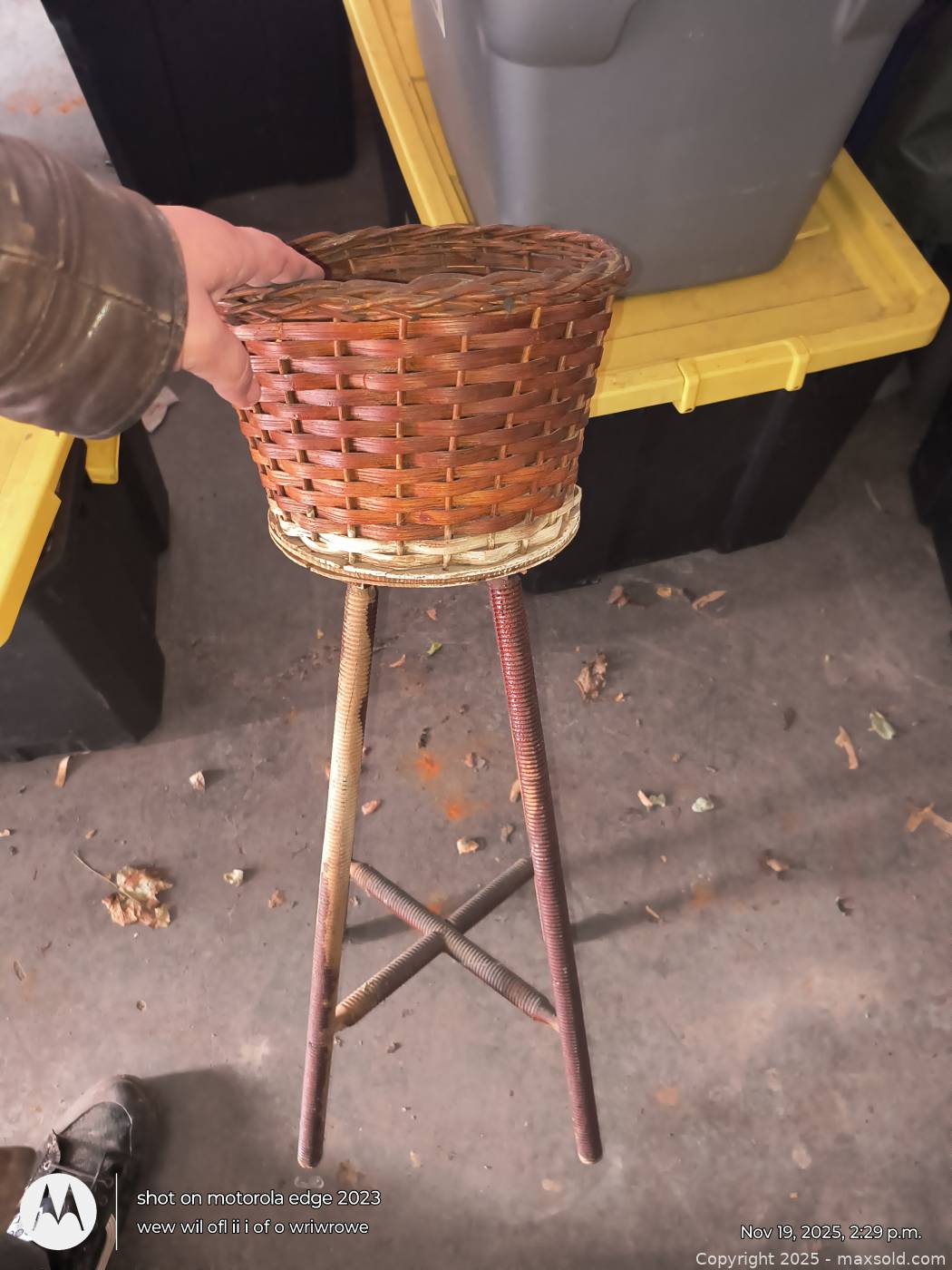 Wicker plant stand with wood legs | Maxsold