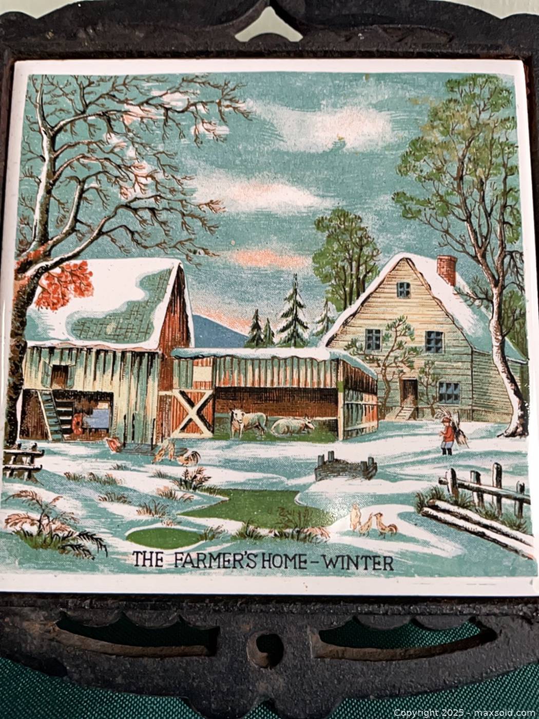 Cast iron trivets with winter scene tiles, pair | Maxsold