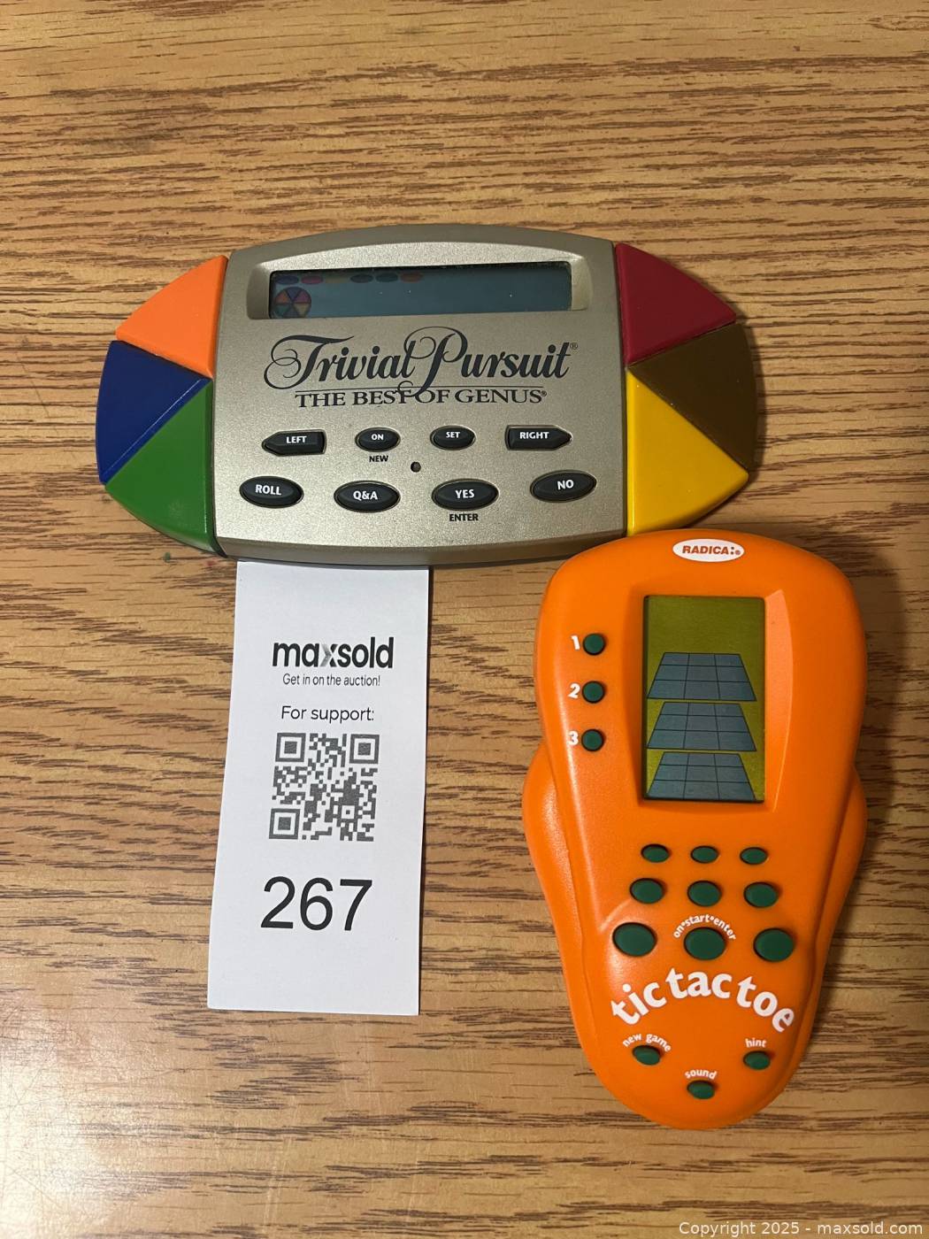 Battery handheld trivia and tic-tac-toe games | Maxsold