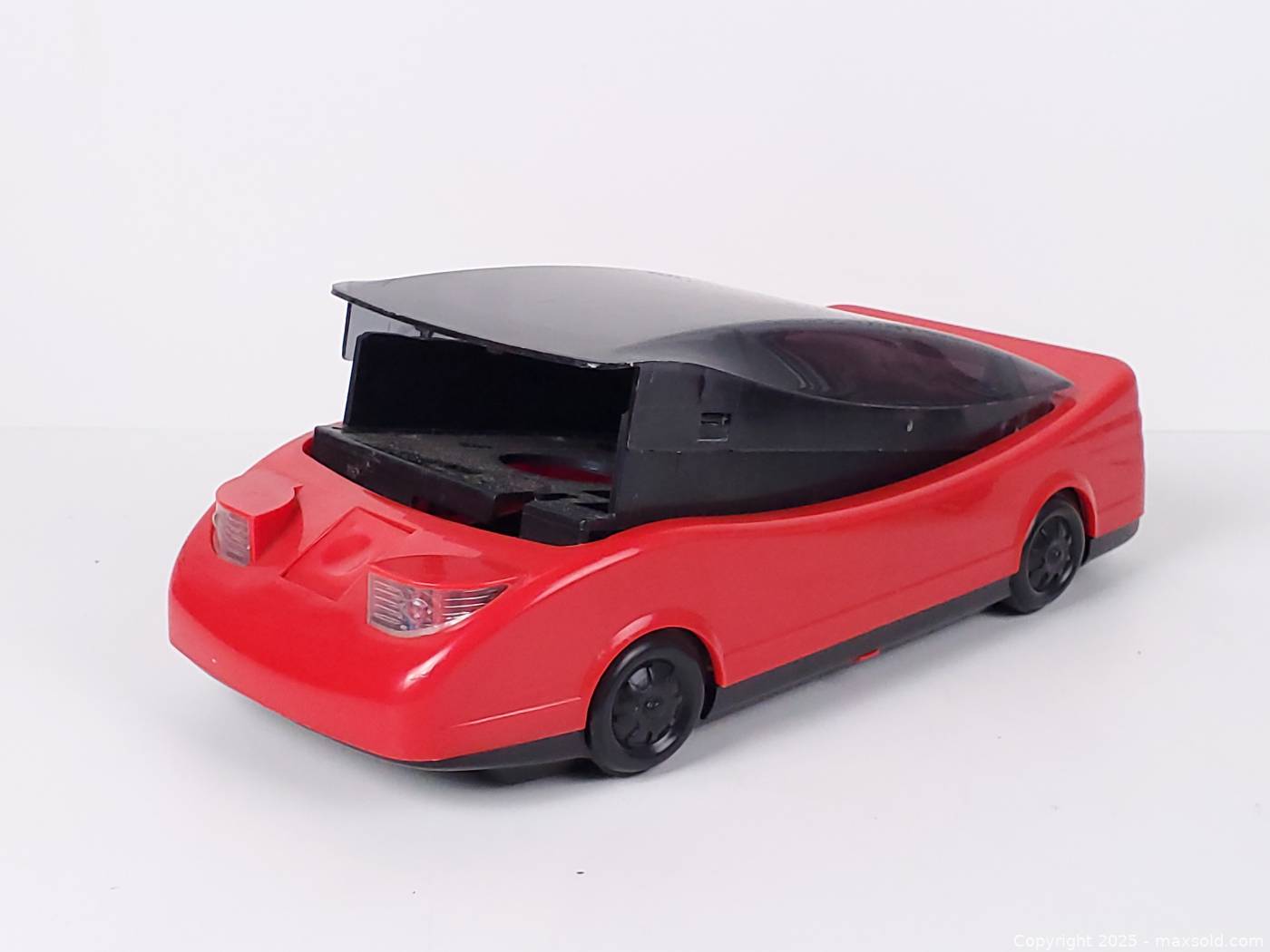 Curtis red sports car VHS cassette rewinder | Maxsold